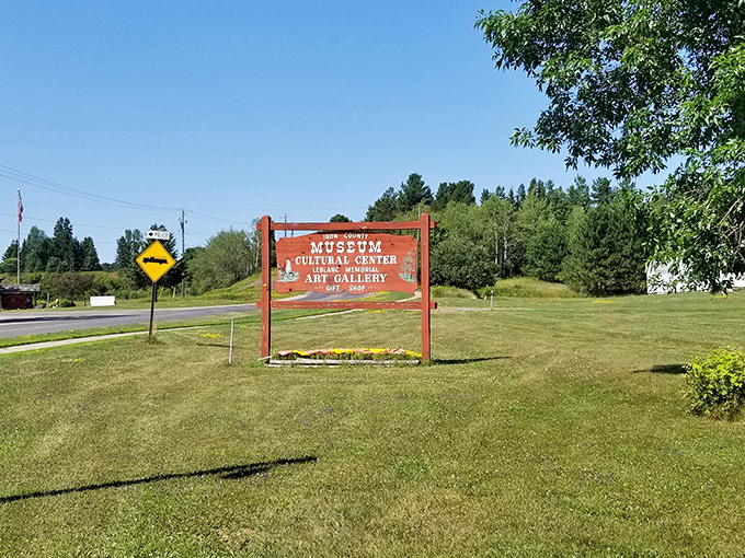 Signage: The museum's welcome sign stands like a friendly sentinel, promising historical treasures just beyond the turn &ndash; no pop-up ads included.