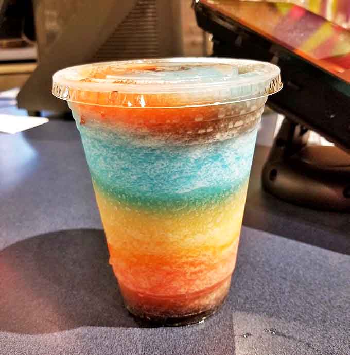 A cup of liquid rainbow that promises brain freeze and happiness in equal measure &ndash; worth every shivering second.