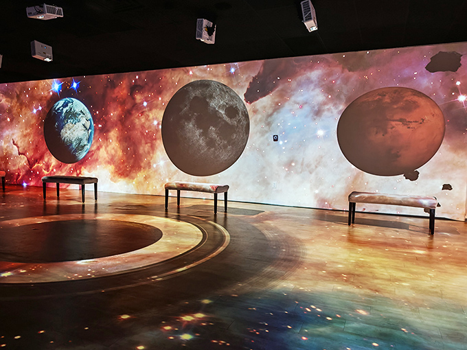 To the moon! Walk among the stars, with enormous projections of Earth, Mars, and the cosmos surrounding you.