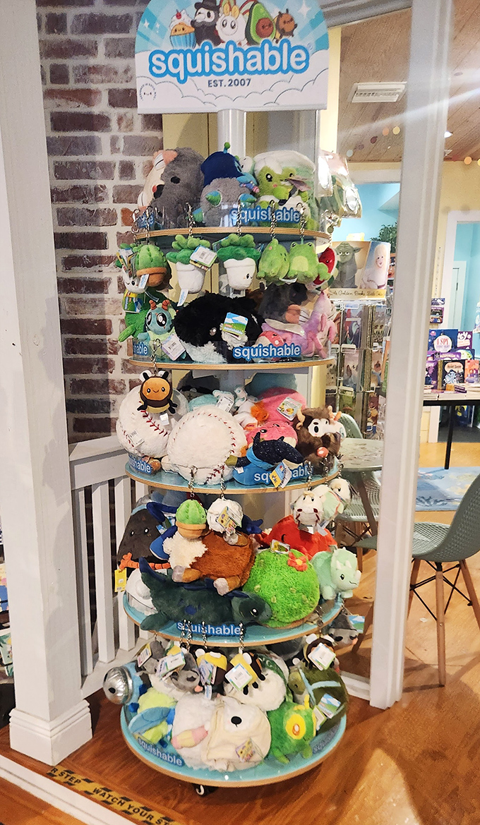 The Squishable display tower offers huggable companions for readers of all ages, proving that this bookstore understands comfort comes in many forms.