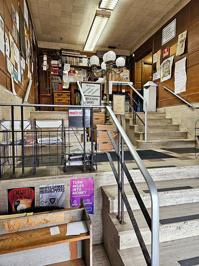 A hand-painted sign points the way to "MORE BOOKS," as if the thousands surrounding you weren't enough to satisfy your literary appetite.