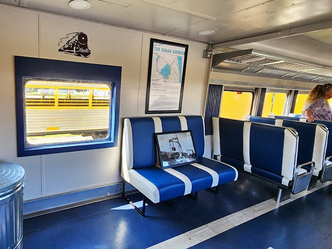 The retro seating inside evokes mid-century travel style, when the journey itself was considered part of the vacation rather than just a means to an end.