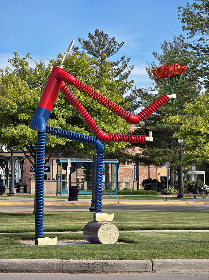 The Dutchman: This whimsical sculpture crafted from colorful pipes adds a playful, modern touch to the traditional Dutch landscape.