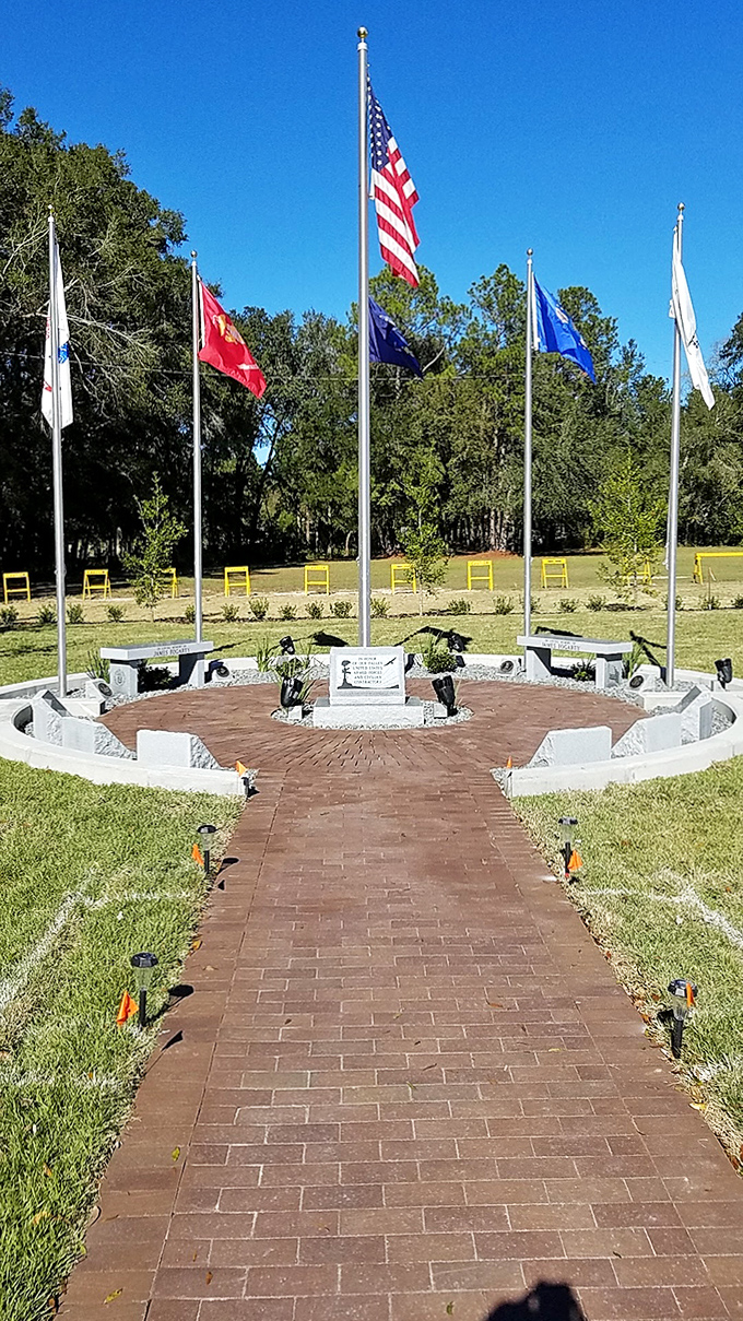Veterans memorial stands as a solemn reminder of service amid the town's natural playground.