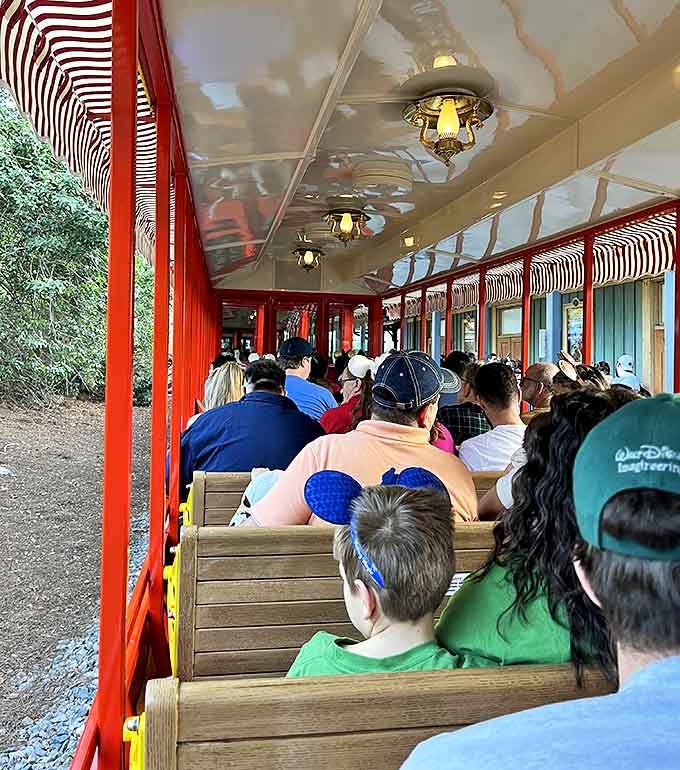 Passengers enjoy panoramic views of the park from comfortable wooden benches &ndash; a leisurely alternative to the usual theme park hustle.