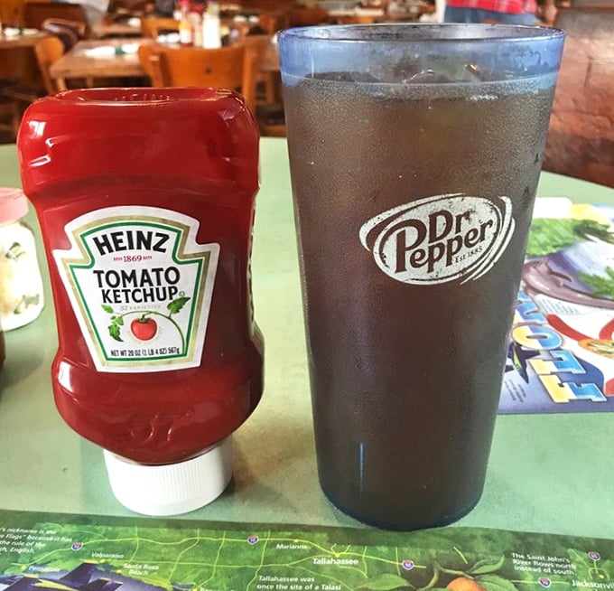 The classic combo &ndash; ice-cold Dr. Pepper alongside Heinz ketchup, simple pleasures that complete the authentic diner experience.