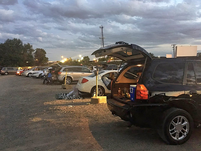The pre-show parking lot buzz feels like a neighborhood block party where everyone's invited and the dress code is gloriously casual.