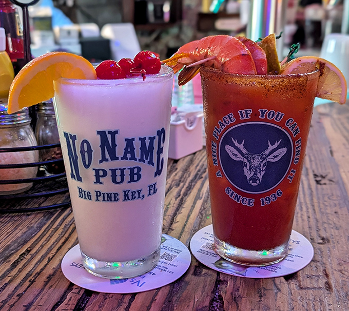 Vacation in a glass! These colorful concoctions&mdash;one creamy, one spicy&mdash;come garnished with fruit and served in signature No Name glassware.