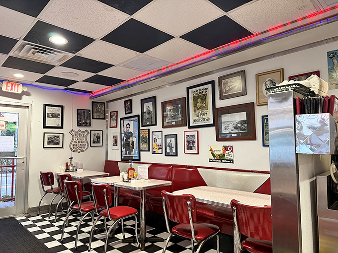 Vintage photographs line the walls, telling Miami Beach stories while diners create new memories in booths bathed in the warm glow of red neon.