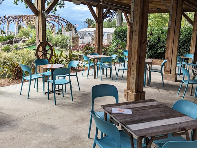 The open-air dining area offers the perfect vantage point to plot your mini golf strategy or celebrate your unlikely hole-in-one.