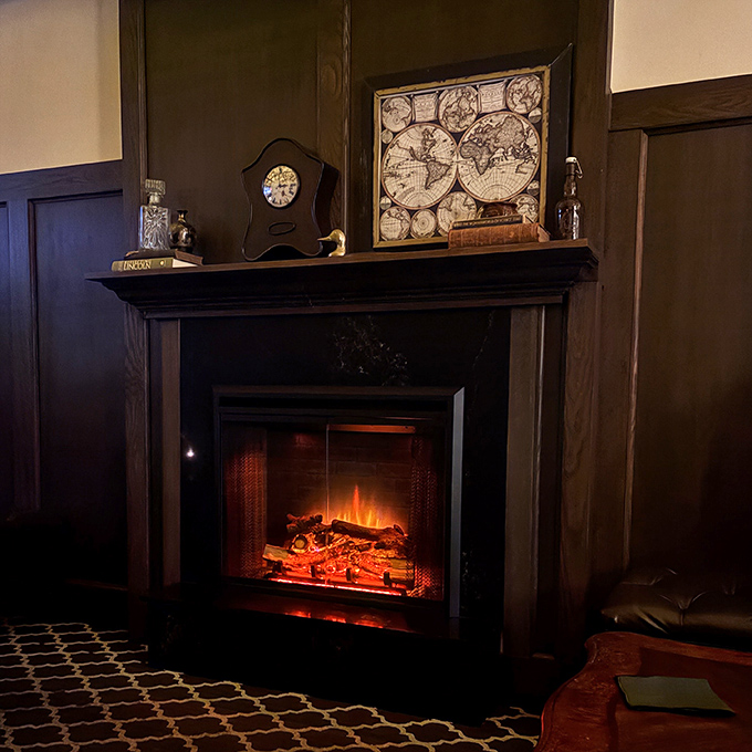 The crackling fireplace adds warmth to both the space and the spirits, creating a cozy nook for whispered conversations and lingering glances.