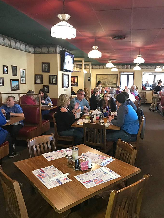 The dining room buzzes with conversation &ndash; locals greeting each other across tables while first-timers experience their inaugural Red Devil meal.