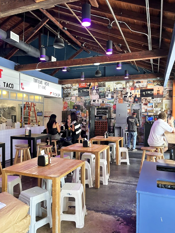 The dining room hums with conversation and satisfaction &ndash; simple wooden tables and stools signal you're here for the food, not the furniture.