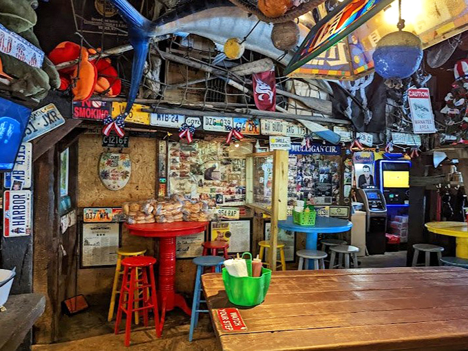 Every inch tells a story at Le Tub, where decades of memorabilia create a museum of maritime miscellany and good times past.