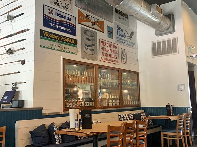Rustic wooden tables, nautical decor, and that giant mural create the perfect backdrop for seafood feasts that make memories as vivid as the colors on the wall.