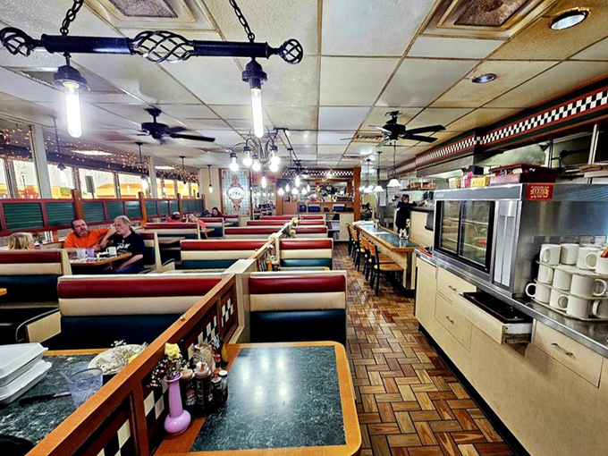 The brick-patterned floor has supported decades of satisfied customers, while booths offer front-row seats to the parade of enormous portions.
