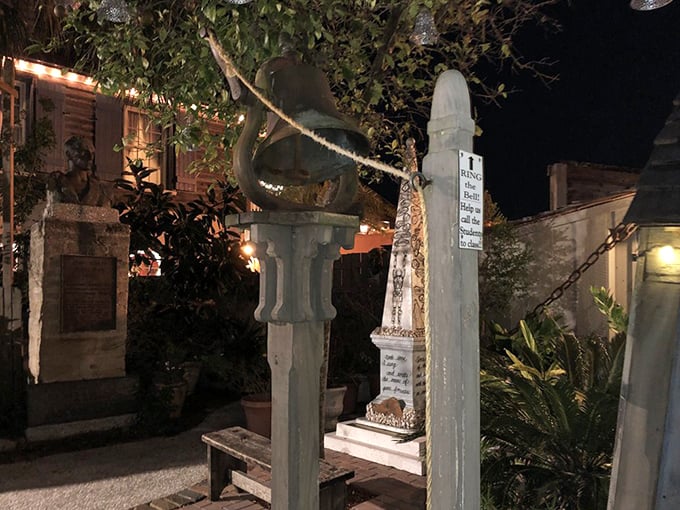 Nighttime Bell Display: This atmospheric evening shot captures the school bell that once regulated colonial students' days. Some traditions never change.