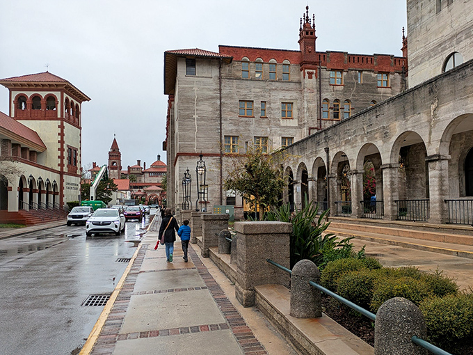 Rain-slicked streets add dramatic flair to St. Augustine's historic buildings, their weathered stones having witnessed centuries of Florida storms.