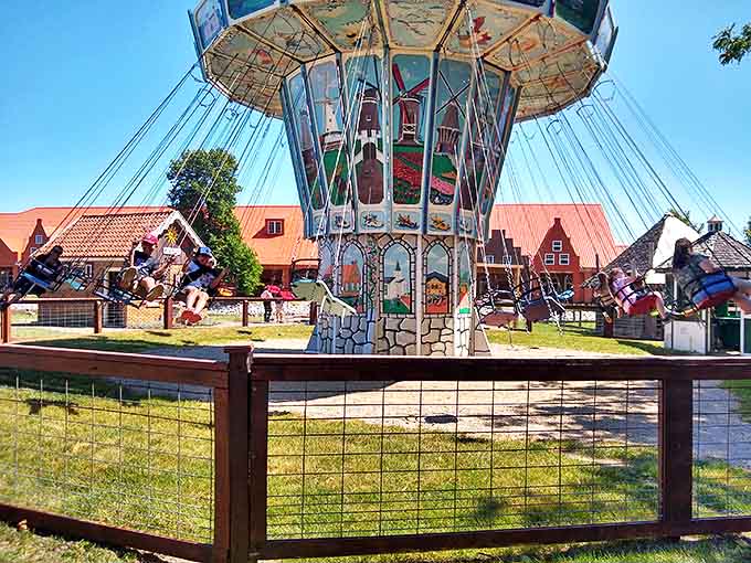 Old-world amusements bring smiles to modern faces – this traditional swing ride offers gentle thrills with a side of nostalgia.