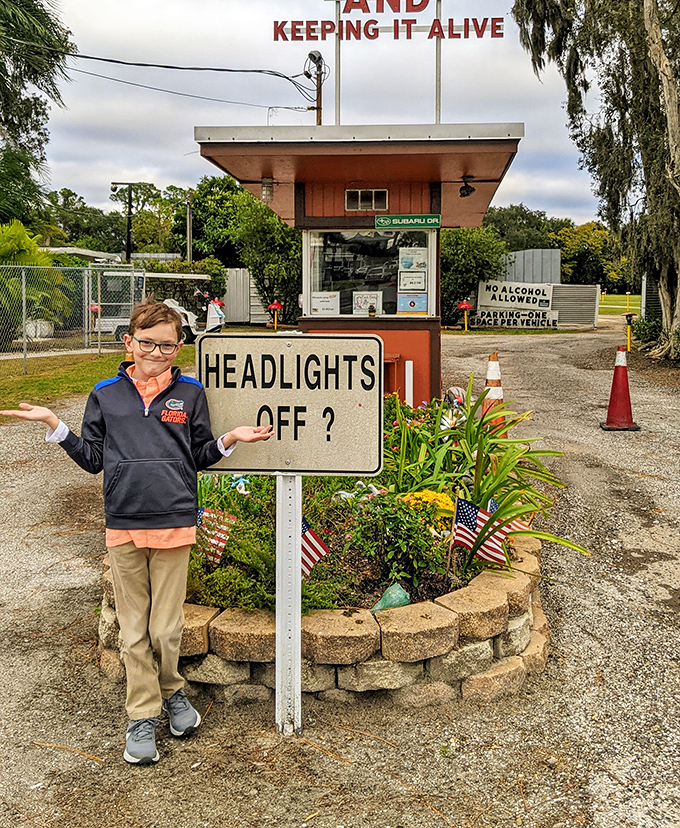 Young visitors discover the magic of outdoor cinema, where "Headlights Off?" isn't just a sign but an invitation to adventure.