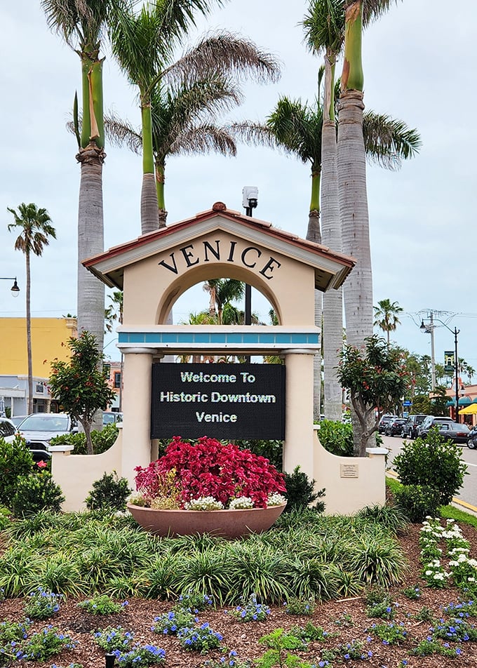 The welcoming archway announces your arrival to a place where Northern Italian architecture meets Florida sunshine in perfect harmony.