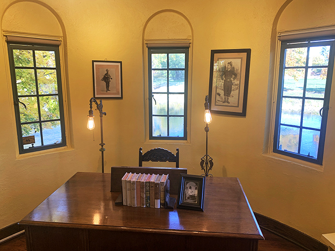 Arched windows frame river views in this writing studio where bestselling wilderness adventures were born one keystroke at a time.