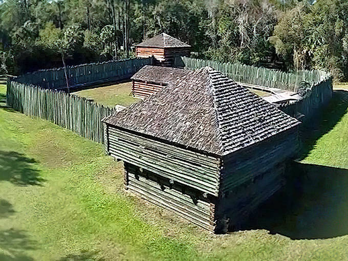 Fort Foster's wooden palisade walls and blockhouse recreate the frontier fortifications that once protected settlers during the Seminole Wars.