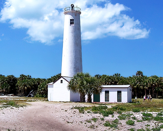 Standing sentinel on its island home, Egmont Key Lighthouse watches over Tampa Bay, accessible only by boat for those seeking lighthouse adventures off the beaten path.