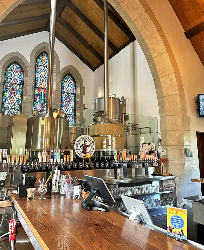 Behind the counter, brewing equipment gleams like sacred vessels, standing tall where an altar once was &ndash; a shrine to the craft of brewing.
