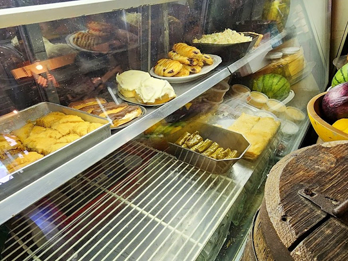 Behind glass, baked goods wait patiently &ndash; flaky pastries and dense brownies made from recipes handed down through generations of skilled hands.