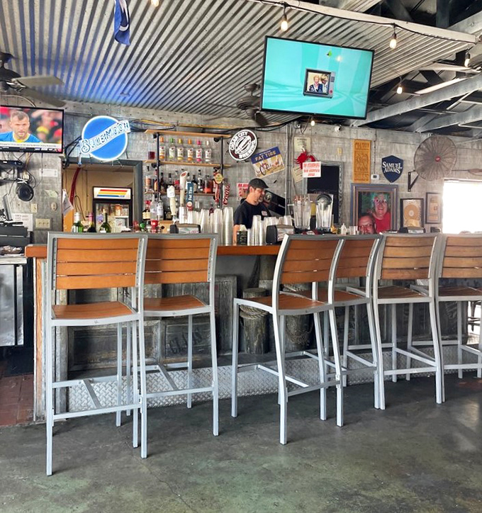 The bar area feels like a Jimmy Buffett song come to life, where everyone's on island time and worries melt away.
