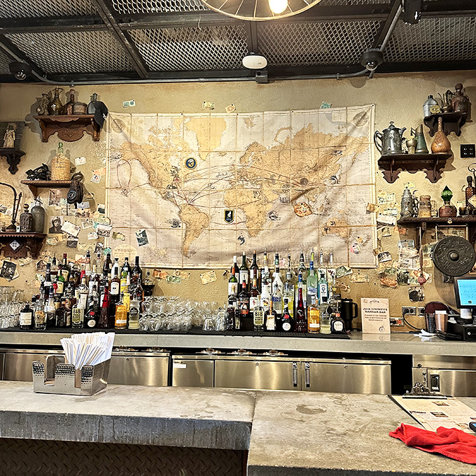 The bar beckons with bottles gleaming like newly discovered treasures&mdash;that world map has seen more adventures than most passports.