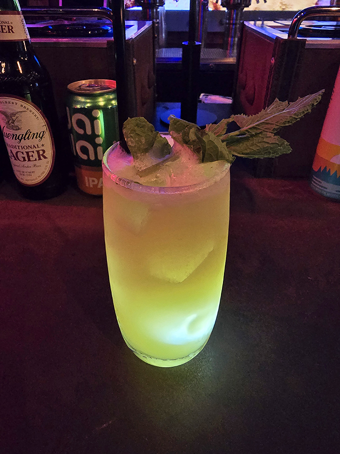 This sunshine-yellow cocktail topped with fresh mint might be the closest thing to drinking actual happiness in a glass.