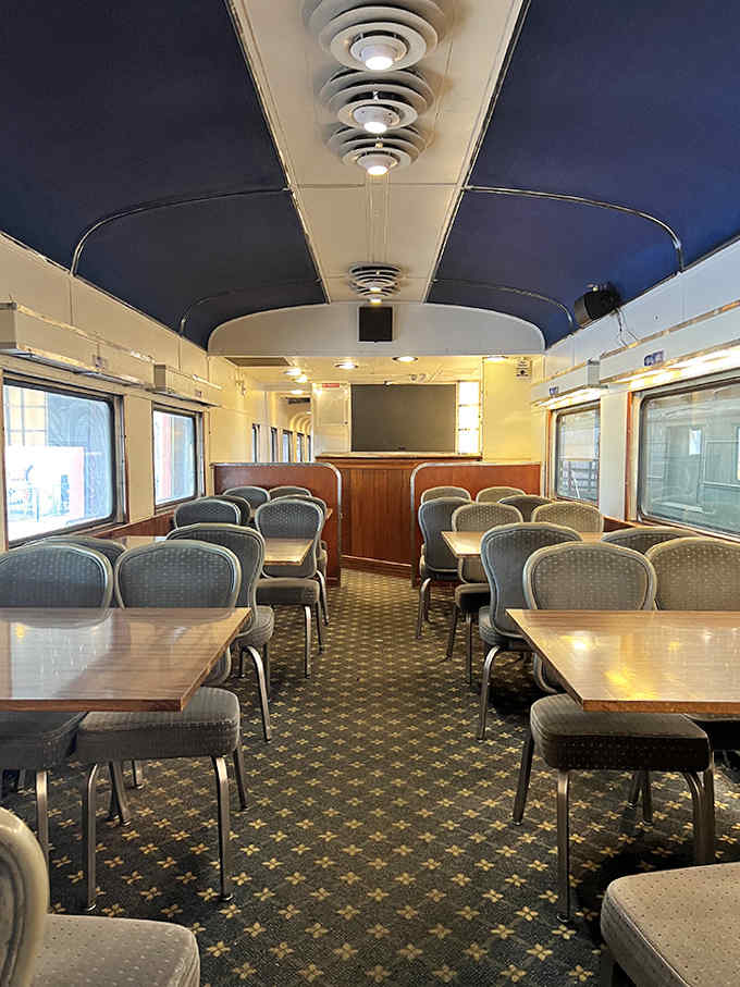 Dining cars transformed meals into events, proving that eating a sandwich tastes better when you're doing it while rolling through the countryside.
