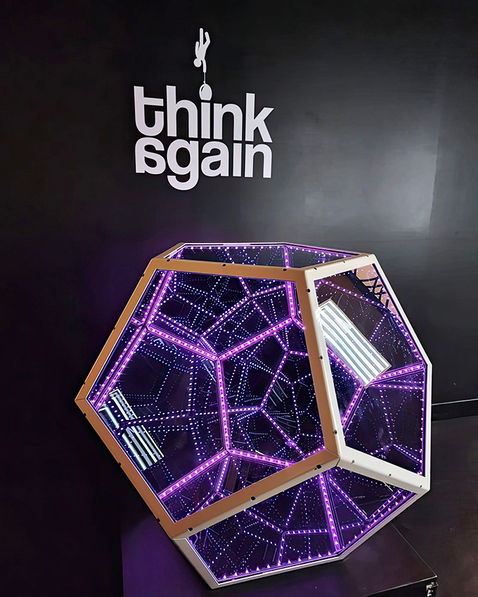 The Infinity Dodecahedron Lamp creates endless reflections in a geometric light show. It's like peering into another dimension where physics majors go to relax after finals.