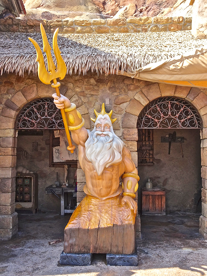 King Triton stands guard with his mighty trident. That beard maintenance routine must be intense under the sea.