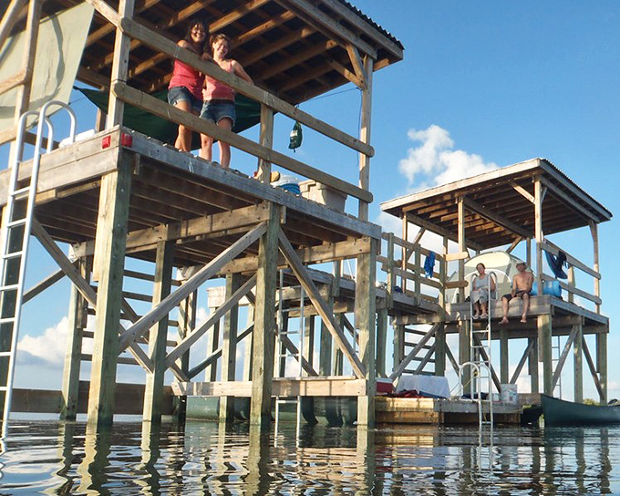 Looking up at your elevated wilderness escape, where camping gets an aquatic upgrade worth bragging about.