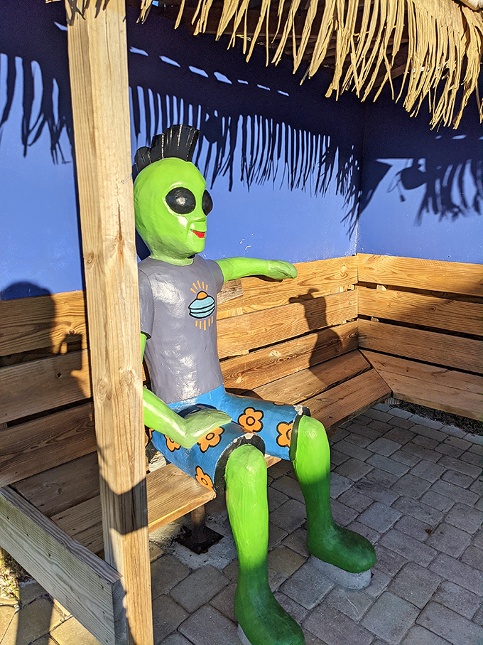 Photo prop: Taking a break from intergalactic travel, this alien relaxes on a bench. His flowery shorts suggest he's fully embraced the Florida lifestyle.
