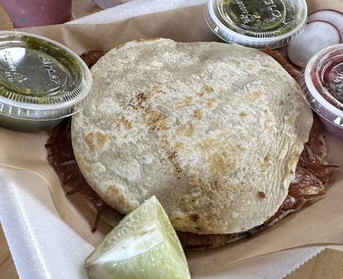 This quesadilla doesn't just contain steak &ndash; it showcases it, the handmade tortilla crisped to perfection, ready to shatter with each satisfying bite.