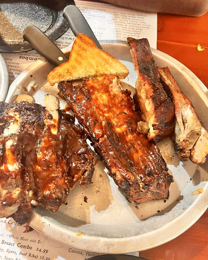 This trio of ribs isn't just dinner&mdash;it's a masterclass in smoke, spice, and patience, accompanied by sides that refuse to be upstaged.