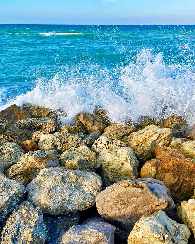 Wave Symphony: Ocean meets rock in a spectacular splash, nature's percussion section performing its timeless composition.