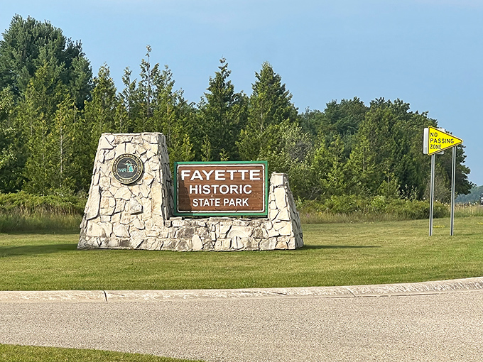 The entrance sign stands like a portal between centuries, promising adventures in history without the inconvenience of actual time travel.
