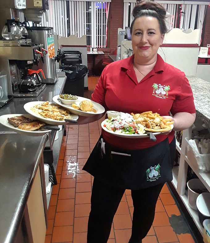 The unsung heroes of your morning, balancing plates with the grace of dancers and remembering how you like your eggs without asking.