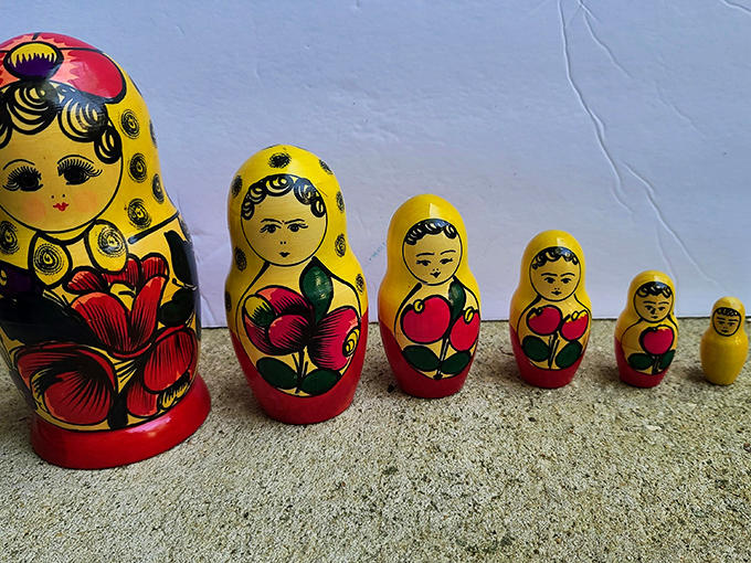 Russian nesting dolls standing at attention&mdash;each one hiding smaller versions of itself like a wooden matryoshka family reunion.