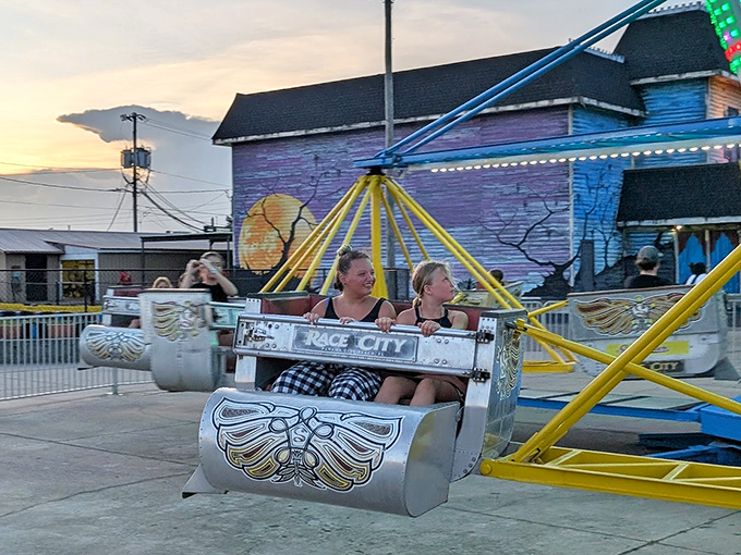 Pure joy captured mid-swing &ndash; these riders demonstrate the perfect blend of terror and delight that defines a great amusement park experience.