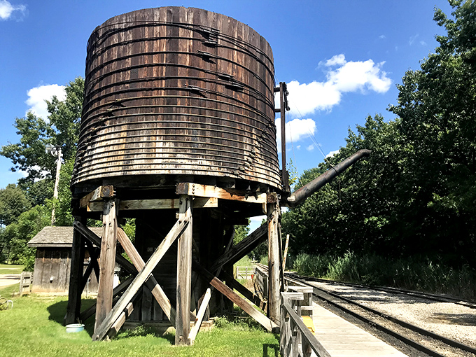 This weathered water tower stands as a testament to railroad infrastructure, once the lifeline for steam engines crisscrossing the country.