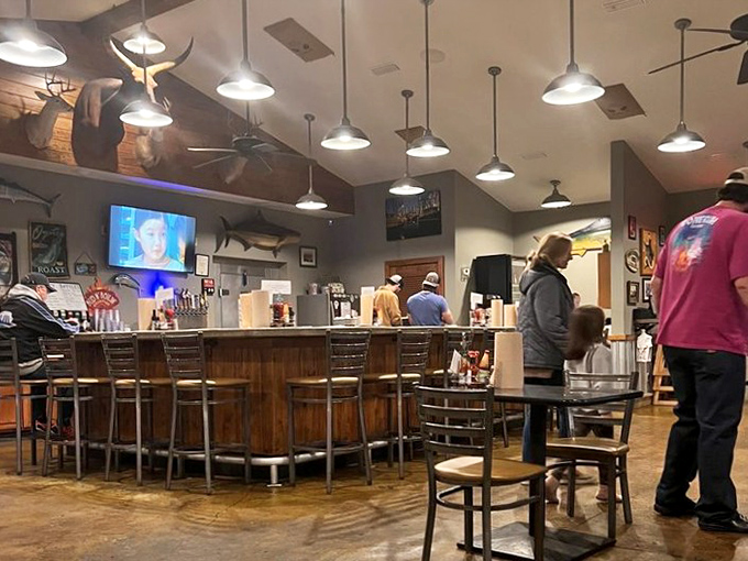 Where seafood stories get taller and friendship deeper &ndash; a curved wooden counter that's witnessed countless "you've got to try this" moments.