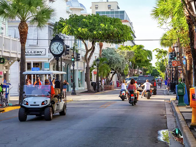 Golf carts and scooters navigate Key West's busy streets, where the hunt for the next great meal becomes a delightful island adventure.