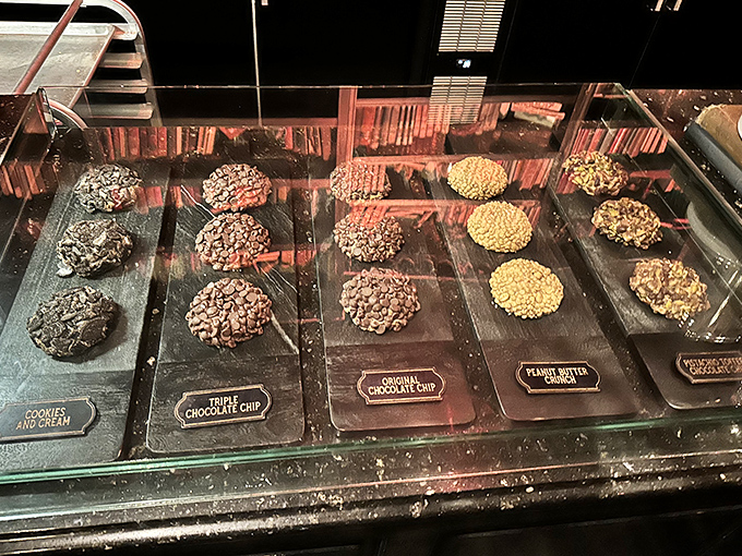 The cookie display case &ndash; where diet plans go to die happy deaths and "just one" becomes the lie we tell ourselves.