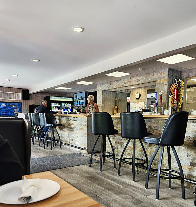 Counter Seating: The bar area welcomes solo diners and regulars alike, where stories flow as freely as the drinks and nobody stays a stranger for long.